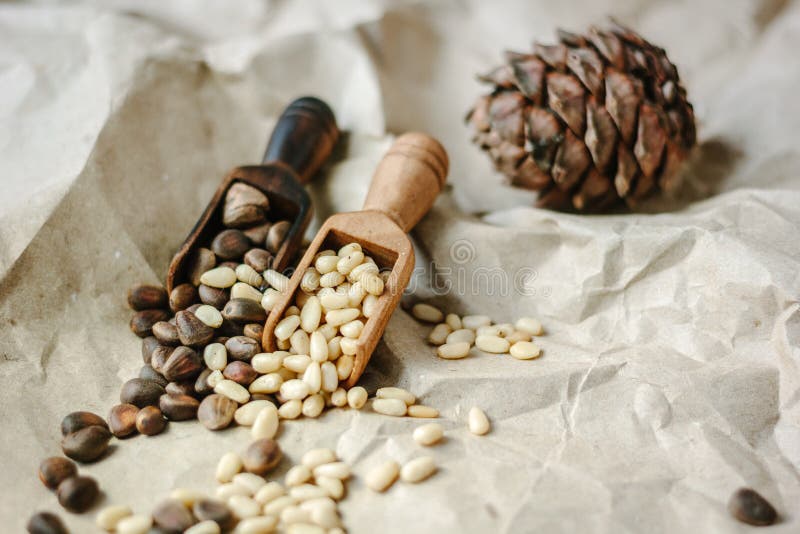 Two Kinds of Pine Nuts - with Shell and without Shell. Stock Photo ...