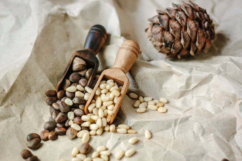Two Kinds of Pine Nuts - with Shell and without Shell. Stock Photo ...