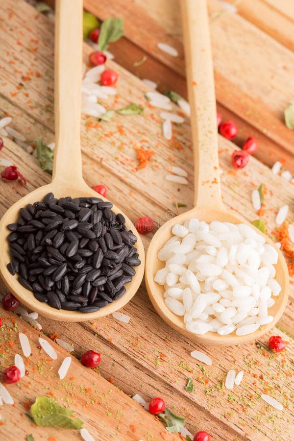 Two Kinds of Rice in Wood Spoons Stock Image - Image of spoon, spoons ...