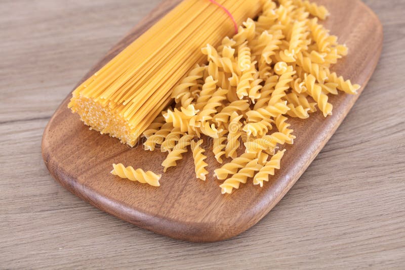 Two Kinds of Spaghetti on Cutting Board Stock Image - Image of health ...