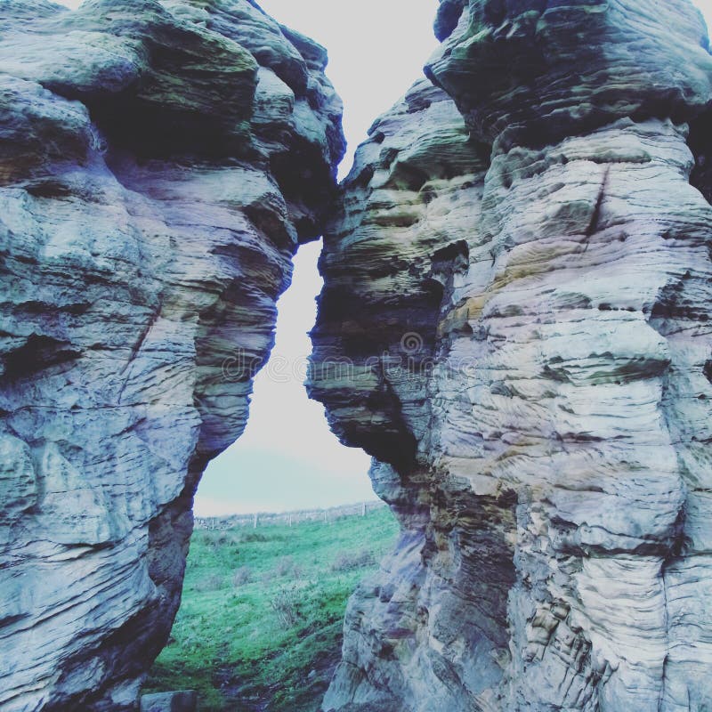 Two kissing rocks stock photo. Image of tree, rock, formation - 215770494