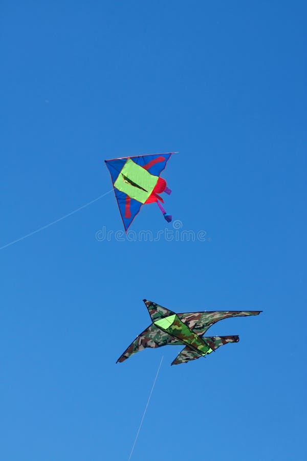 Two Kites Against a Blue Sky Stock Photo - Image of activity, dazzle ...