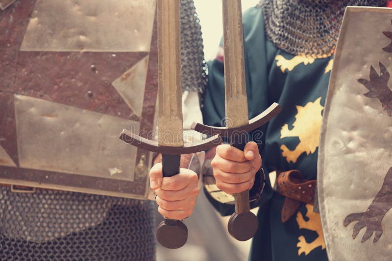 Two knights with swords stock image. Image of power, glove - 31407831