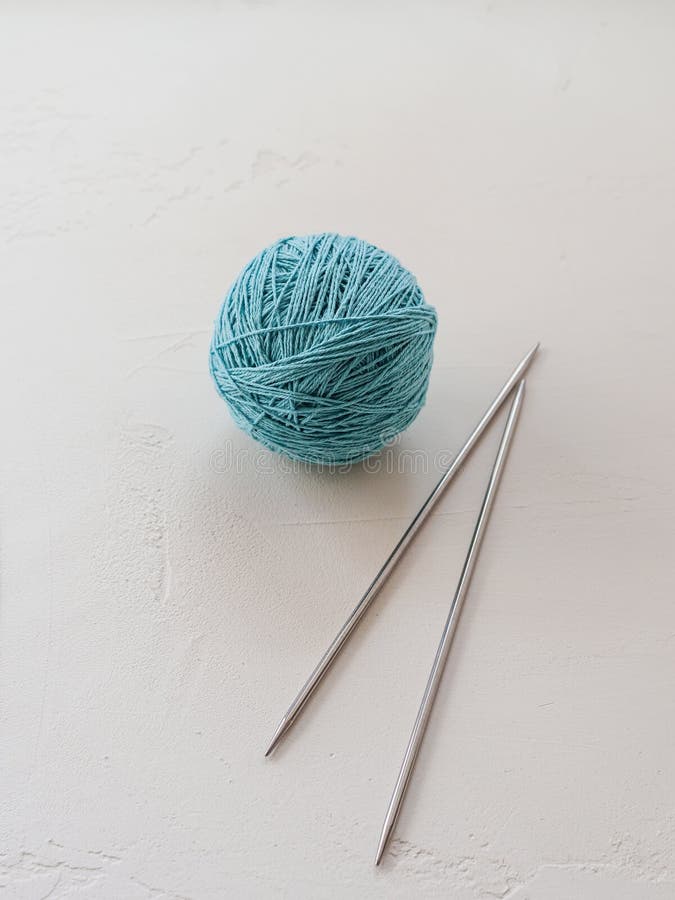 Two Knitting Needles and Blue Threads Stock Image - Image of background ...