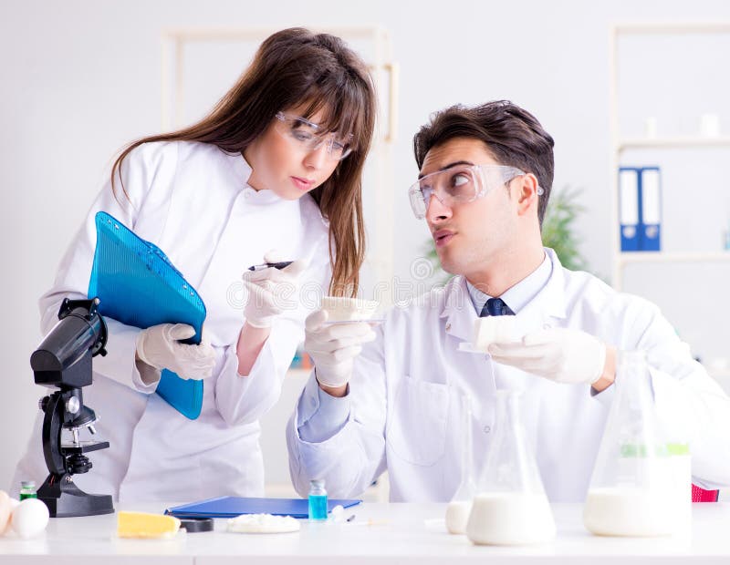 Two Lab Doctor Testing Food Products Stock Photo - Image of diet ...
