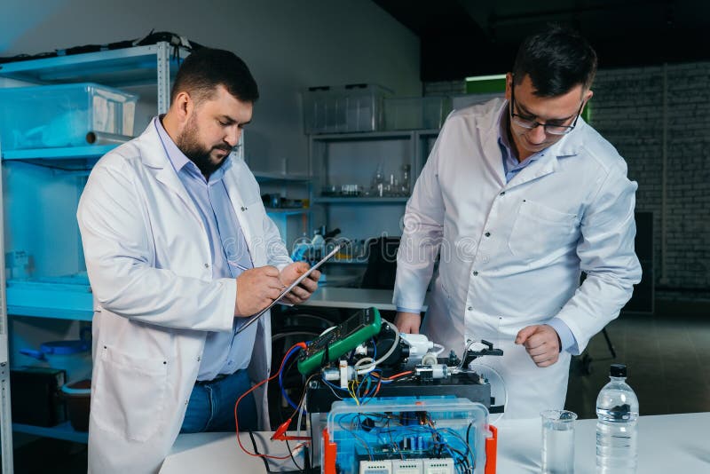 Two Laboratory Assistants are Working on the Development of Innovative ...