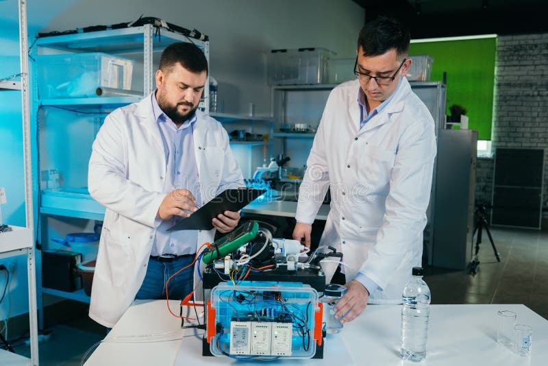 Two Laboratory Assistants are Working on the Development of Innovative ...