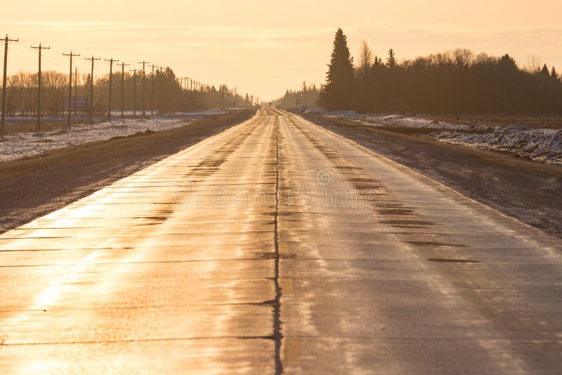 Two Lane Highway Lit by Golden Sunrise Stock Photo - Image of road ...