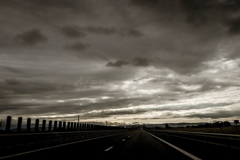 Two Lanes Highway in a Gloomy Overcast Scenery Stock Image - Image of ...