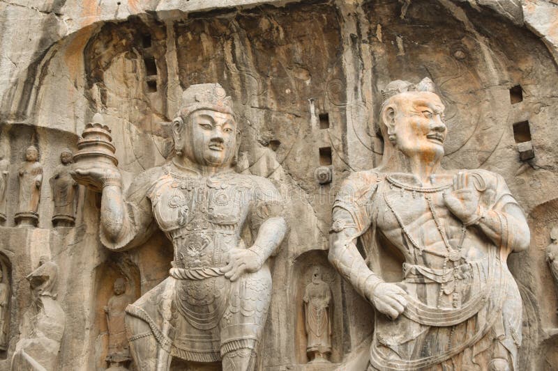 Buddhist Statues Carved into the Cliffs at Longmen Grottoes in Luoyang ...