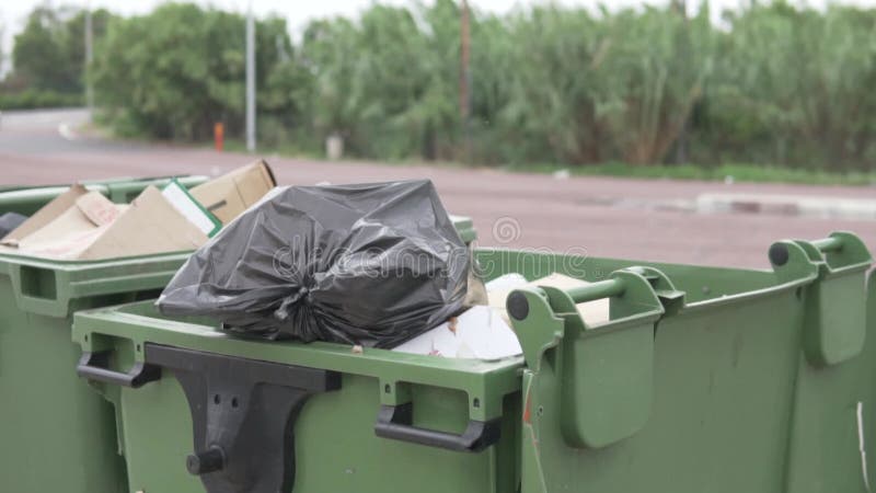 Two Large Garbage Cans Stand on the Highway in Spain in the Summer ...