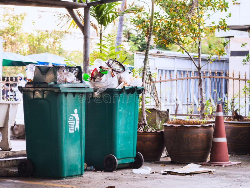 Two Large Green Bins Full of Rubbish in One Place Stock Photo - Image ...