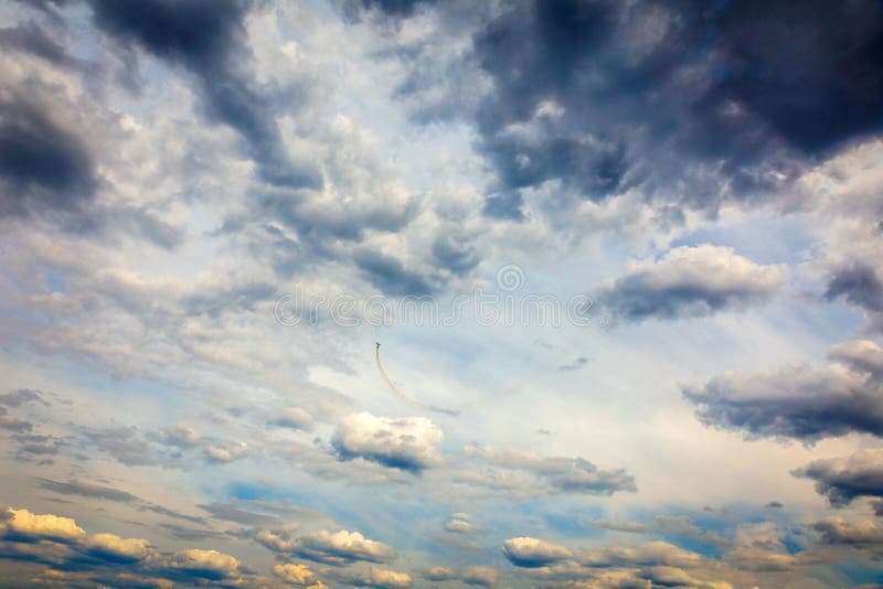 Two Large Jet Planes Fly among Large Blue Storm Clouds Stock Photo ...