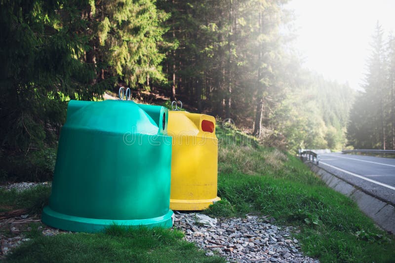 Two Large Plastic Bin for Trash in Forest Near Road Stock Photo - Image ...