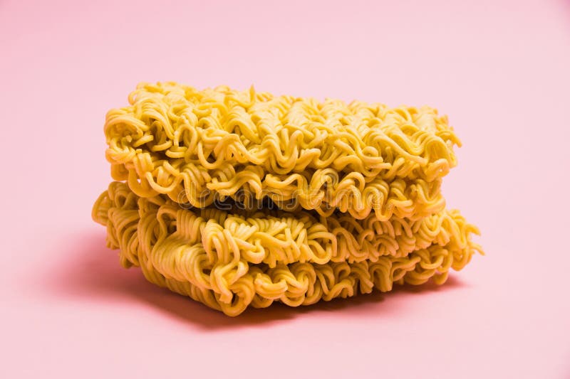 Raw Instant Noodles Close-up on Pink Paper Background with Copy Space ...