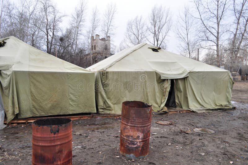 Two Large Tents and Barrels for Fire Stock Image - Image of large ...