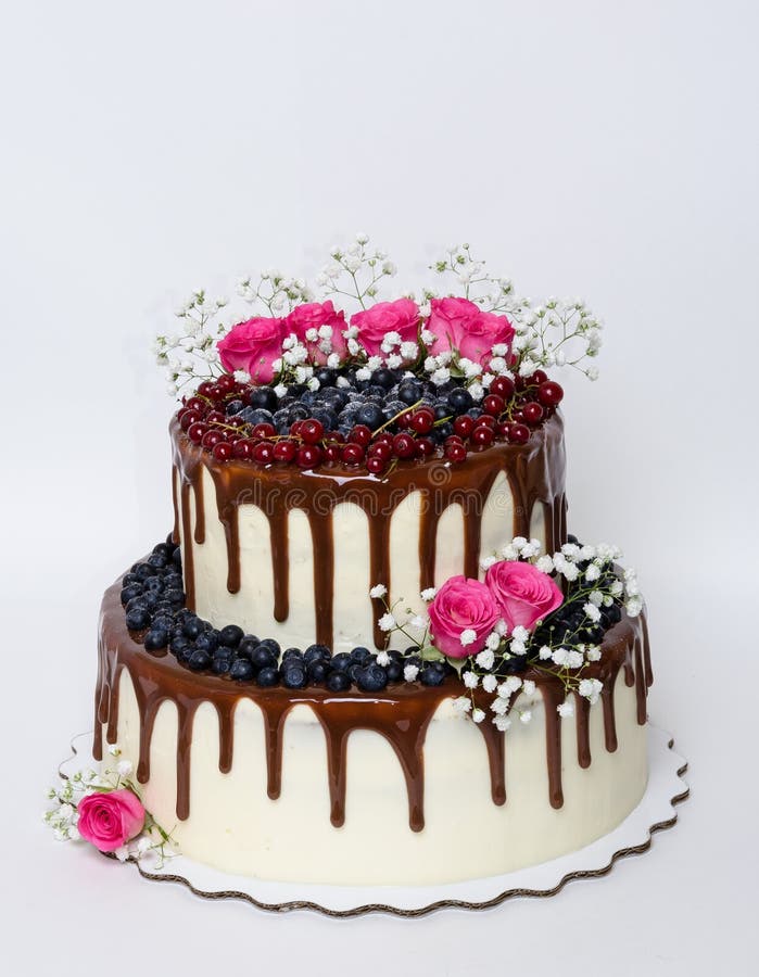 Two Layered Color Drip Wedding Cake with Bilberries, Red Currant Stock ...