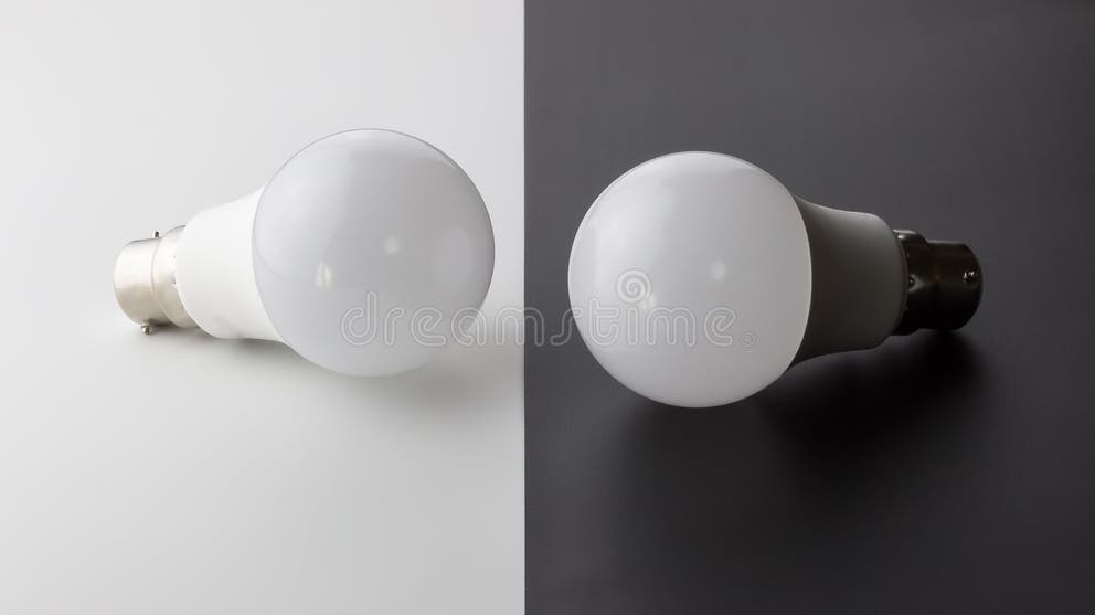 Two Led Bulbs, Next To Each Other. Light Bulbs on Grey and White Split ...