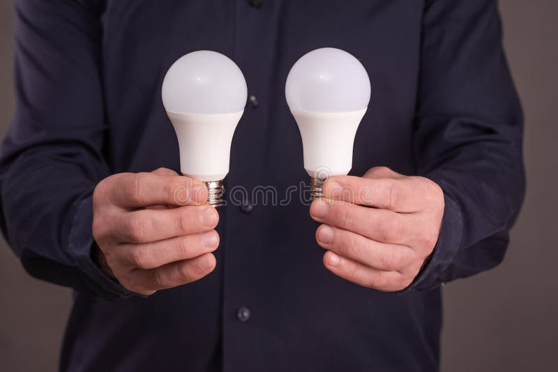 LED Lamps in the Hands of a Man. Concept Stock Photo - Image of male ...