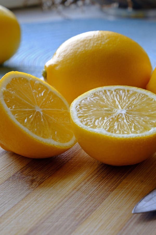 Two Lemon Halves in Portrait Crop Stock Photo - Image of juicy, food ...