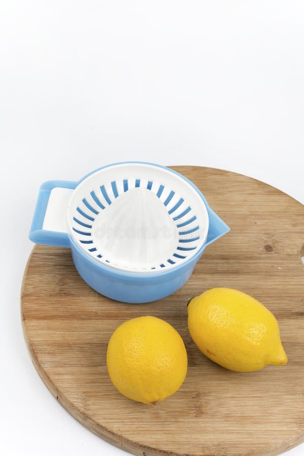 Two Lemon and Strainer on a Wooden Board Stock Image - Image of juice ...