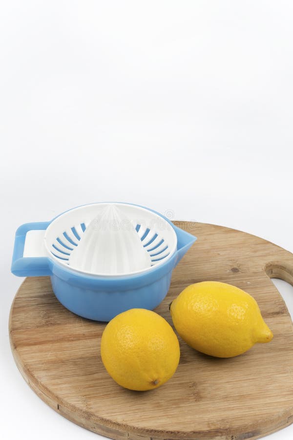 Two Lemon and Strainer on a Wooden Board Stock Photo - Image of drink ...