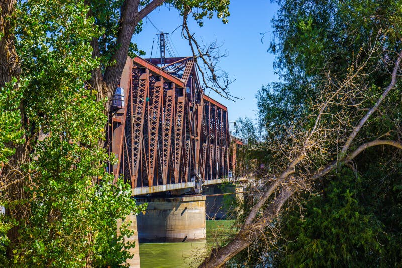 Two Level Rusty Iron Bridge through Trees Stock Image - Image of green ...