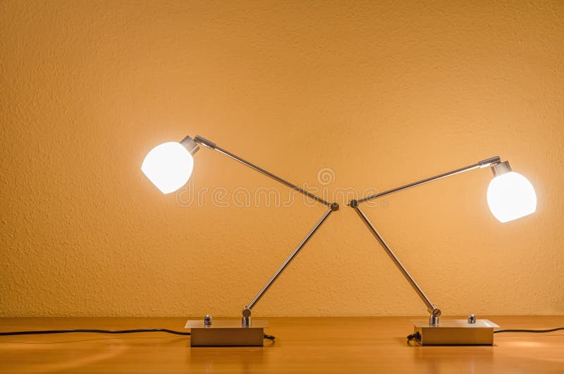 Two lit table lamps stock image. Image of lamps, metal - 48638657