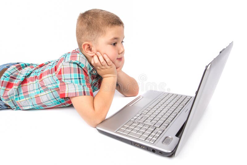 Little boy using a laptop stock photo. Image of portrait - 35379376
