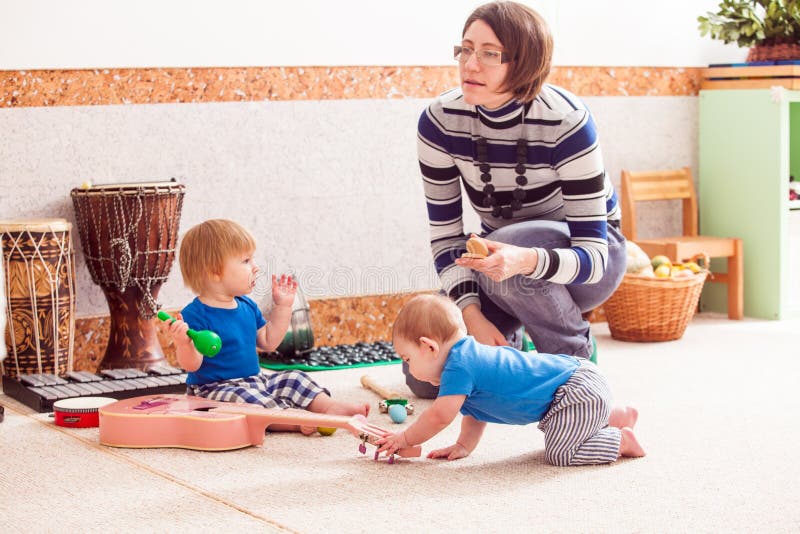 Boys with Musical Instruments Stock Image - Image of indoor, orchestra ...