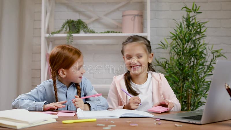 Two Little Children Girl Using Laptop for Doing School Tasks at Home ...