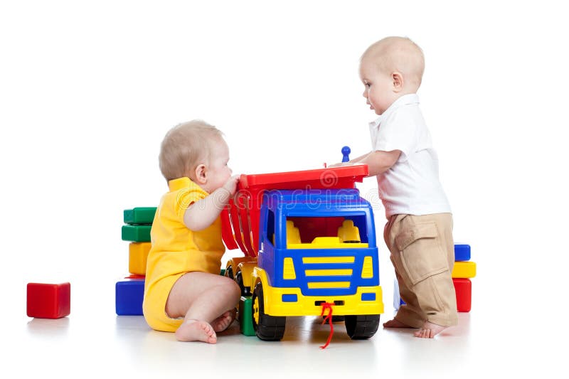 Two Little Children Playing with Color Toys Stock Photo - Image of ...