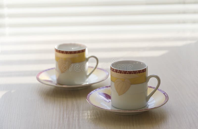 Two little coffee cups. stock image. Image of utensil - 63224771