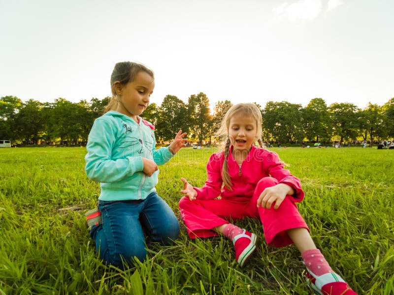 Two Little Friends Girls in the Field. Stock Image - Image of cute ...