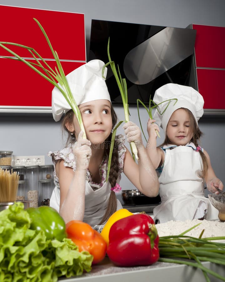 Two little girl cook stock image. Image of caucasian - 19932137