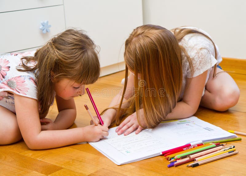 Two Little Girls Drawing on the Floor Stock Photo - Image of crayon ...