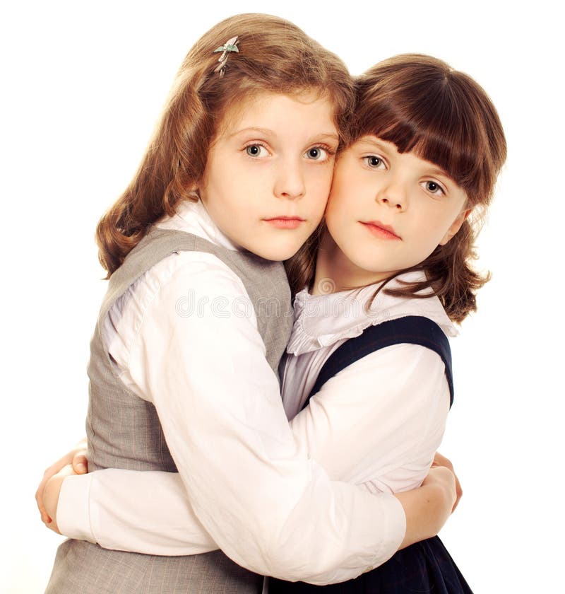 Two Little Girls Hugging. Isolated Stock Photo - Image of dress ...