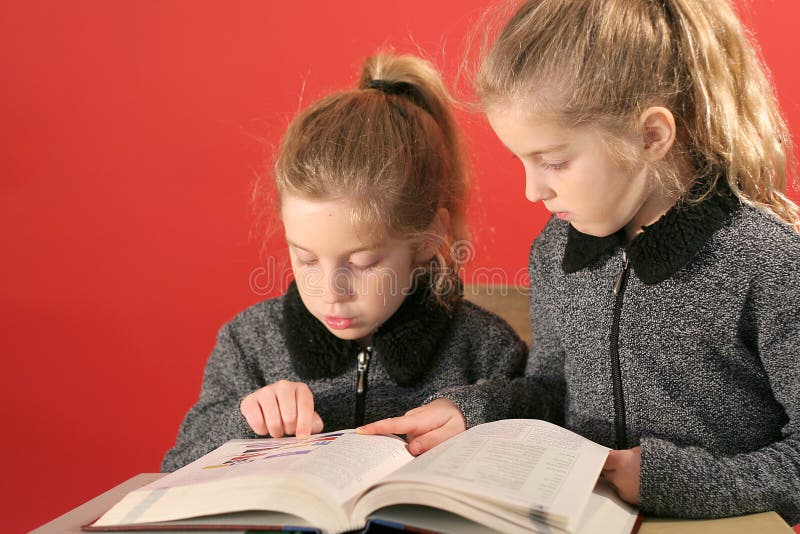 Two little girls studying stock photo. Image of beautiful - 2139260