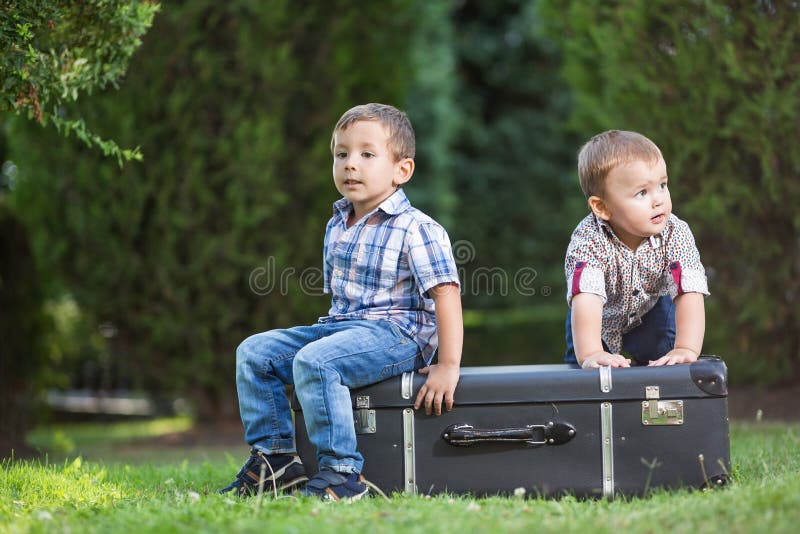 Two Little Kids Playing in the Park Stock Photo - Image of grass ...