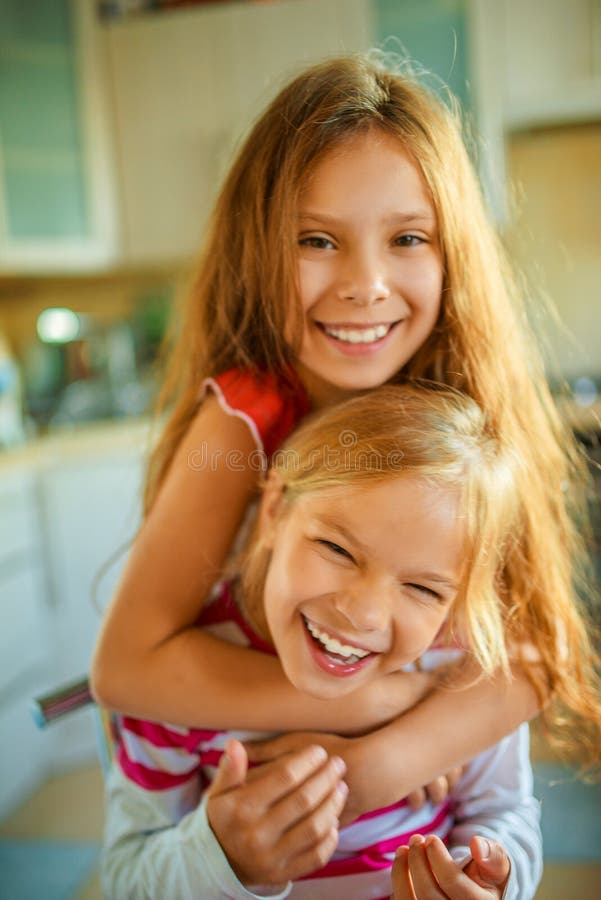 Two Little Sisters Fun Laughing Stock Photo - Image of happy, hair ...