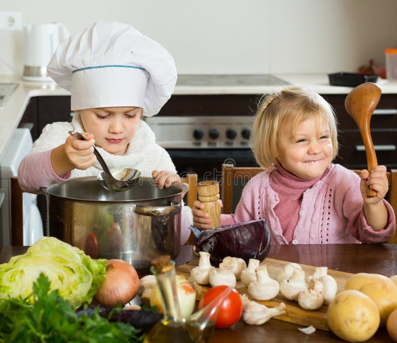 Sisters Learning Lessons at Home Stock Photo - Image of home, caucasian ...