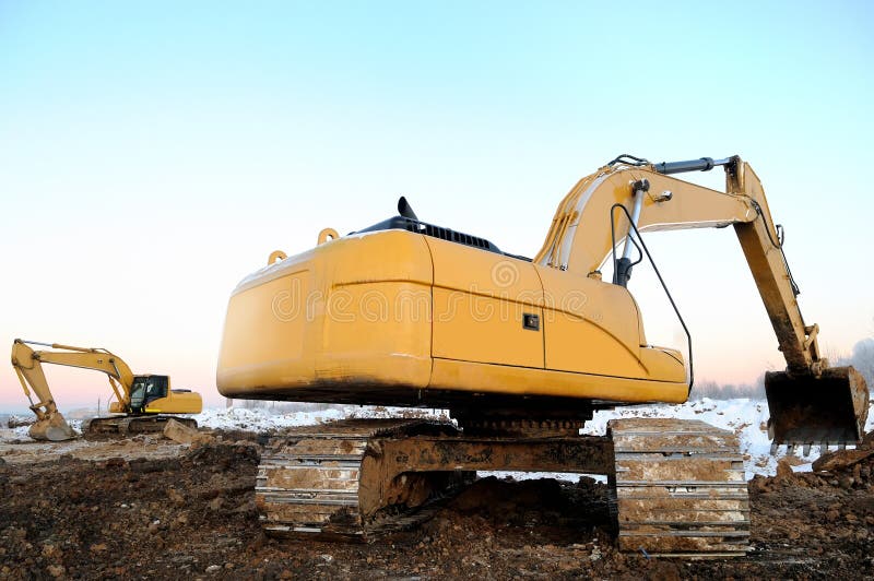 Two Loader Excavators in Open Cast in Winter Stock Image - Image of ...