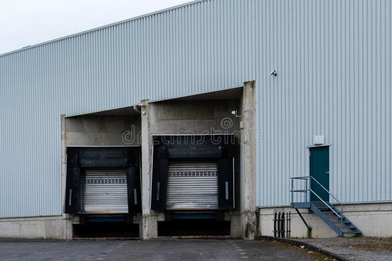 Two Loading Docks Lie Side by Side at a Commercial Warehouse. Stock ...