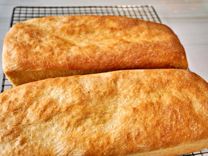 Two Loaves of Bread Cooling Off Stock Photo - Image of food, breakfast ...