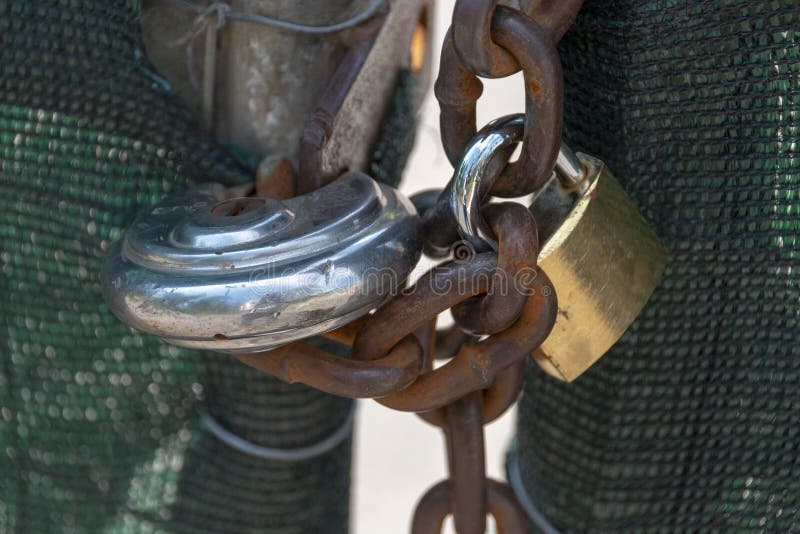 Two Locks and a Chain stock photo. Image of gold, locks - 131145792