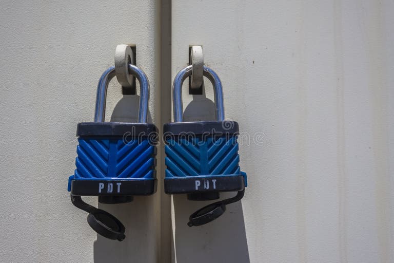 Two Locks Secure Doors stock image. Image of doors, color - 27886081