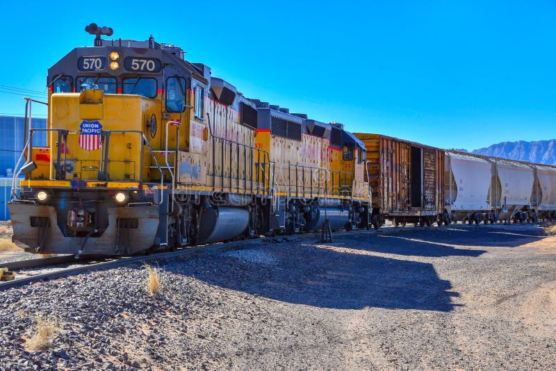 Two Locomotives Pulling a Union Pacific Freight Train Editorial ...