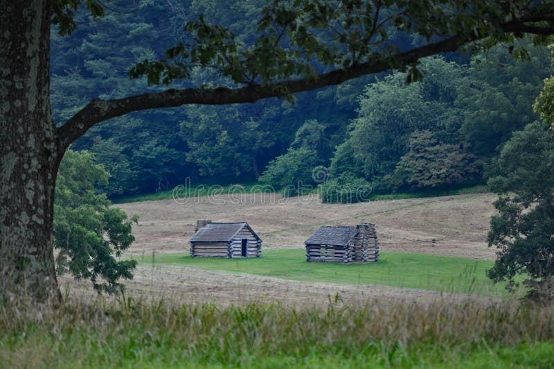 Two Log Cabins in a Wooded Field Stock Photo - Image of rustic, cabin ...