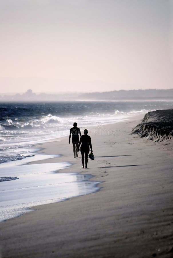 Two lonely figures stock image. Image of wind, coast - 105981503