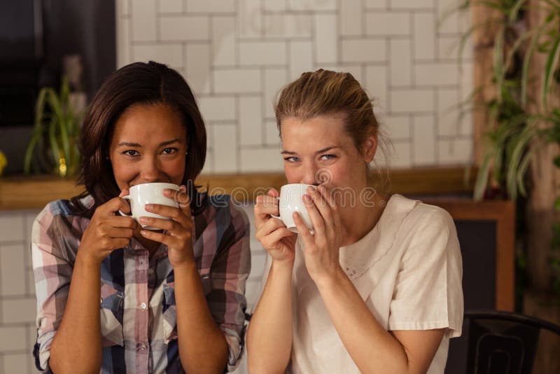 Two Lovely Customer Drinking Coffee Stock Photo - Image of attractive ...